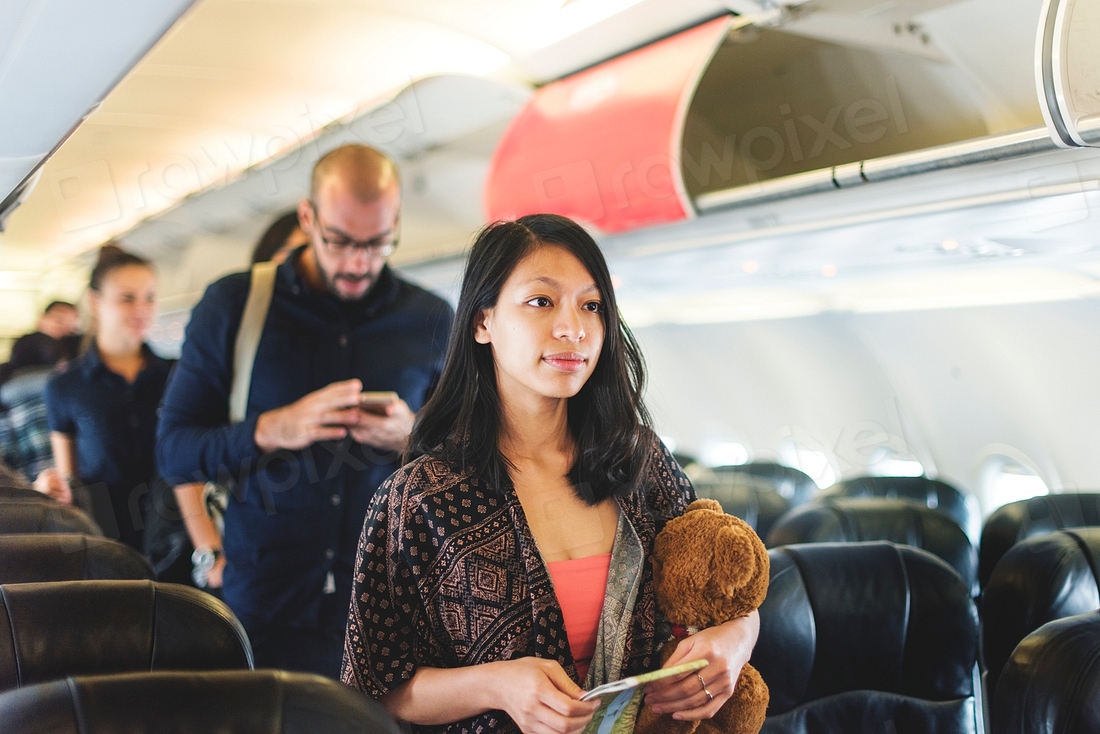 A girl traveling by airplane | Premium Photo - rawpixel