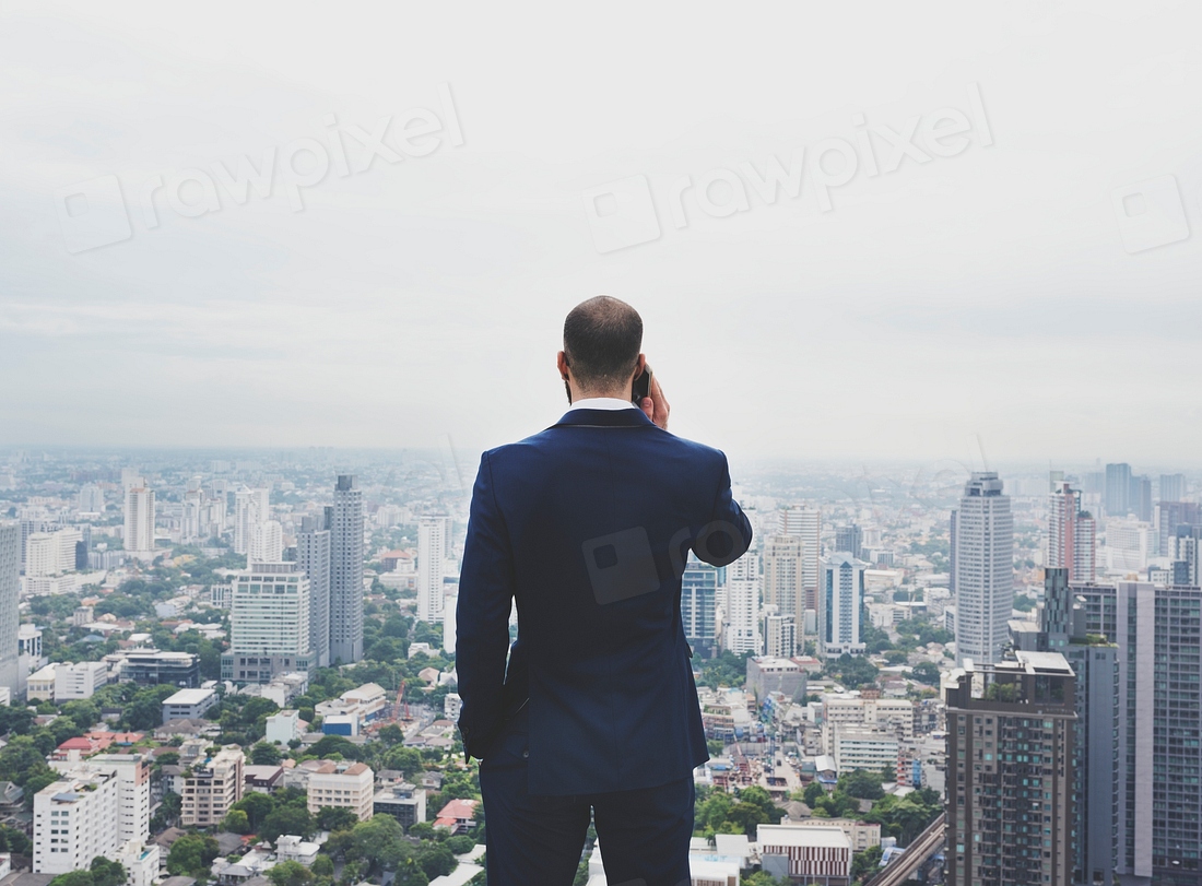 Businessman in the city | Premium Photo - rawpixel