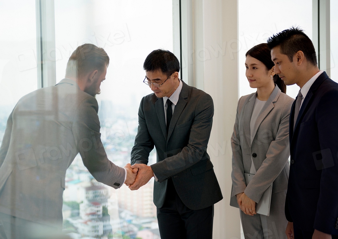 Business Partners Introductionary Handshake Bow | Premium Photo - rawpixel