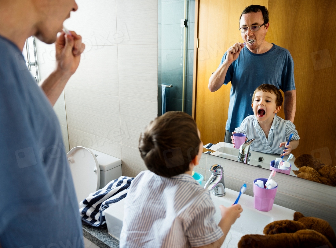 Dad and son brushing their | Premium Photo - rawpixel