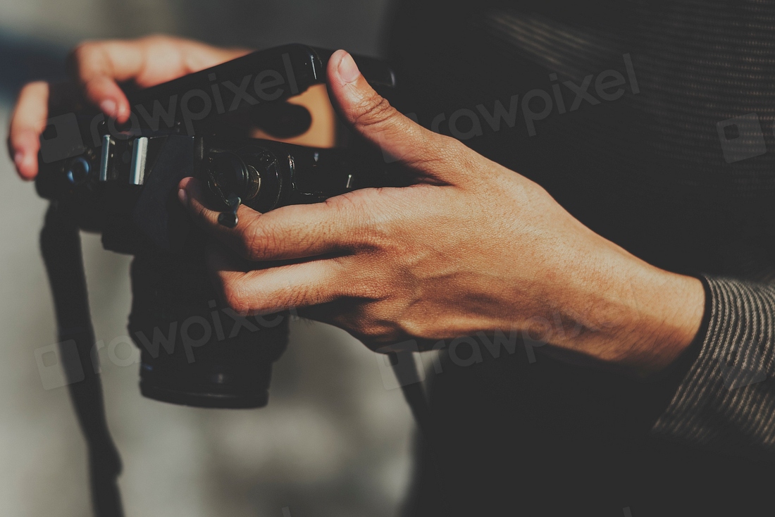 Closeup hands checking film camera | Premium Photo - rawpixel