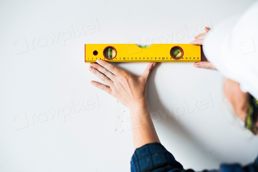 Repairman working measuring ruller wall | Premium Photo - rawpixel
