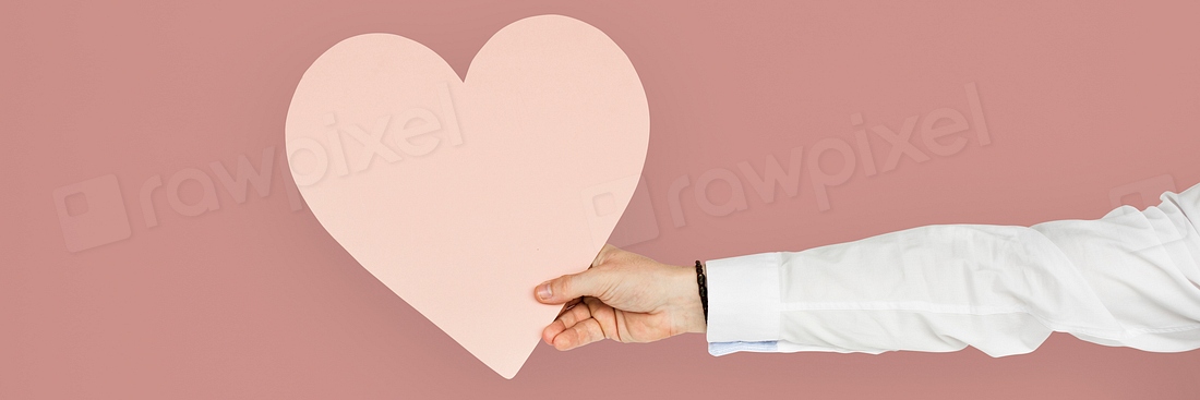 Man holding pink heart valentines | Premium Photo - rawpixel