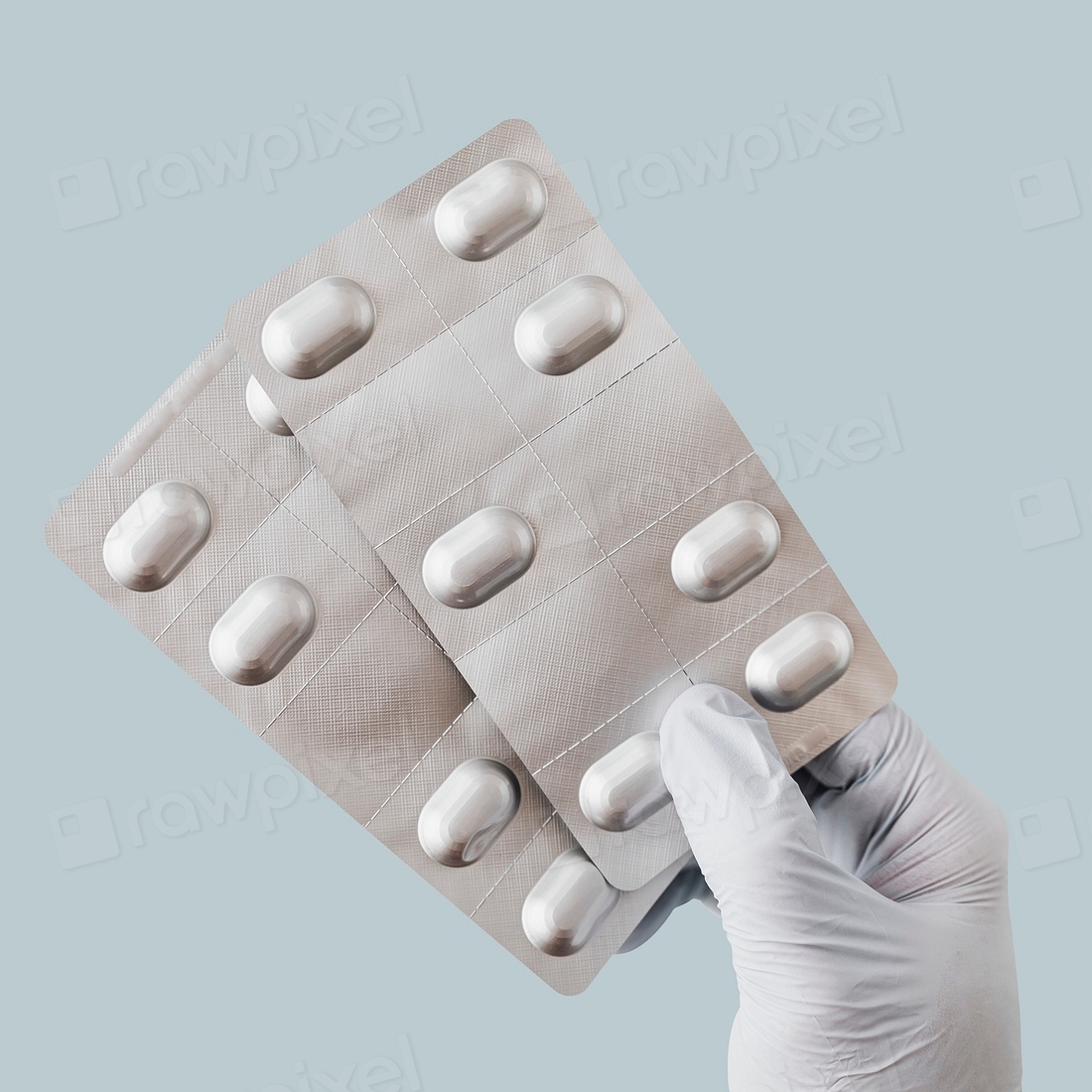 Hand holding medicine packets mockup | Premium PSD - rawpixel