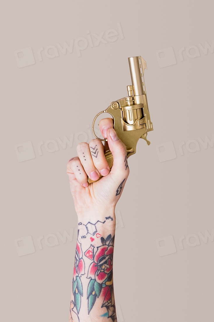 Hand tattoo holding gun raising | Premium PSD - rawpixel