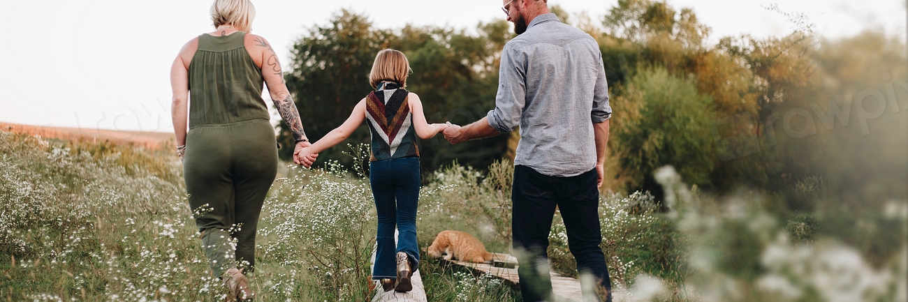 Happy family hand in hand | Premium Photo - rawpixel