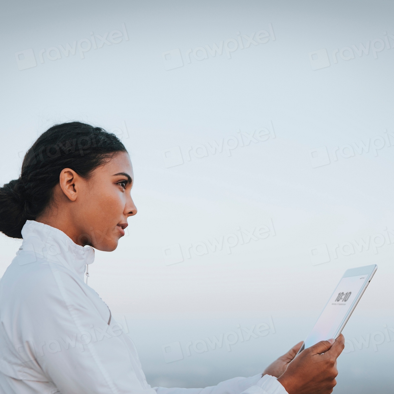 Woman looking her digital tablet | Premium Photo - rawpixel