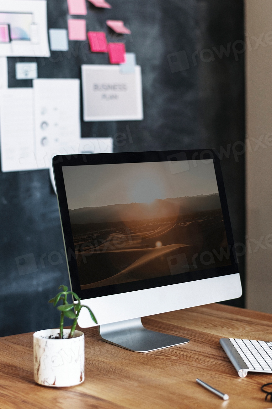 Computer on a wooden desk | Premium Photo - rawpixel