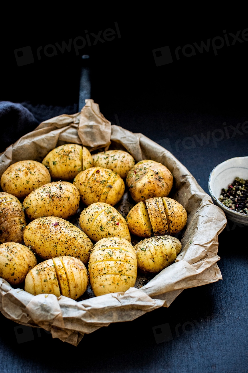 Homemade seasoned baked potatoes. Visit | Free Photo - rawpixel