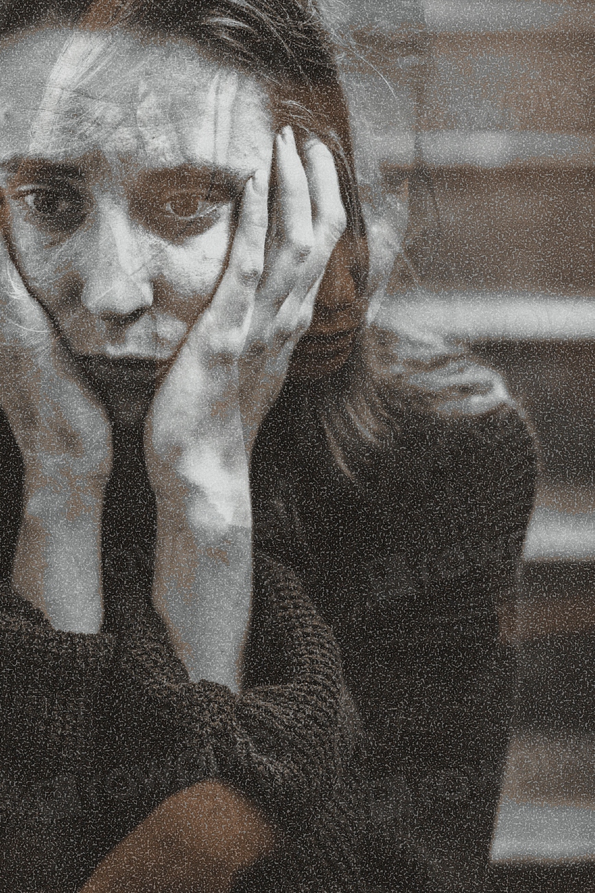 Distressed woman sitting on a staircase | Free Photo - rawpixel
