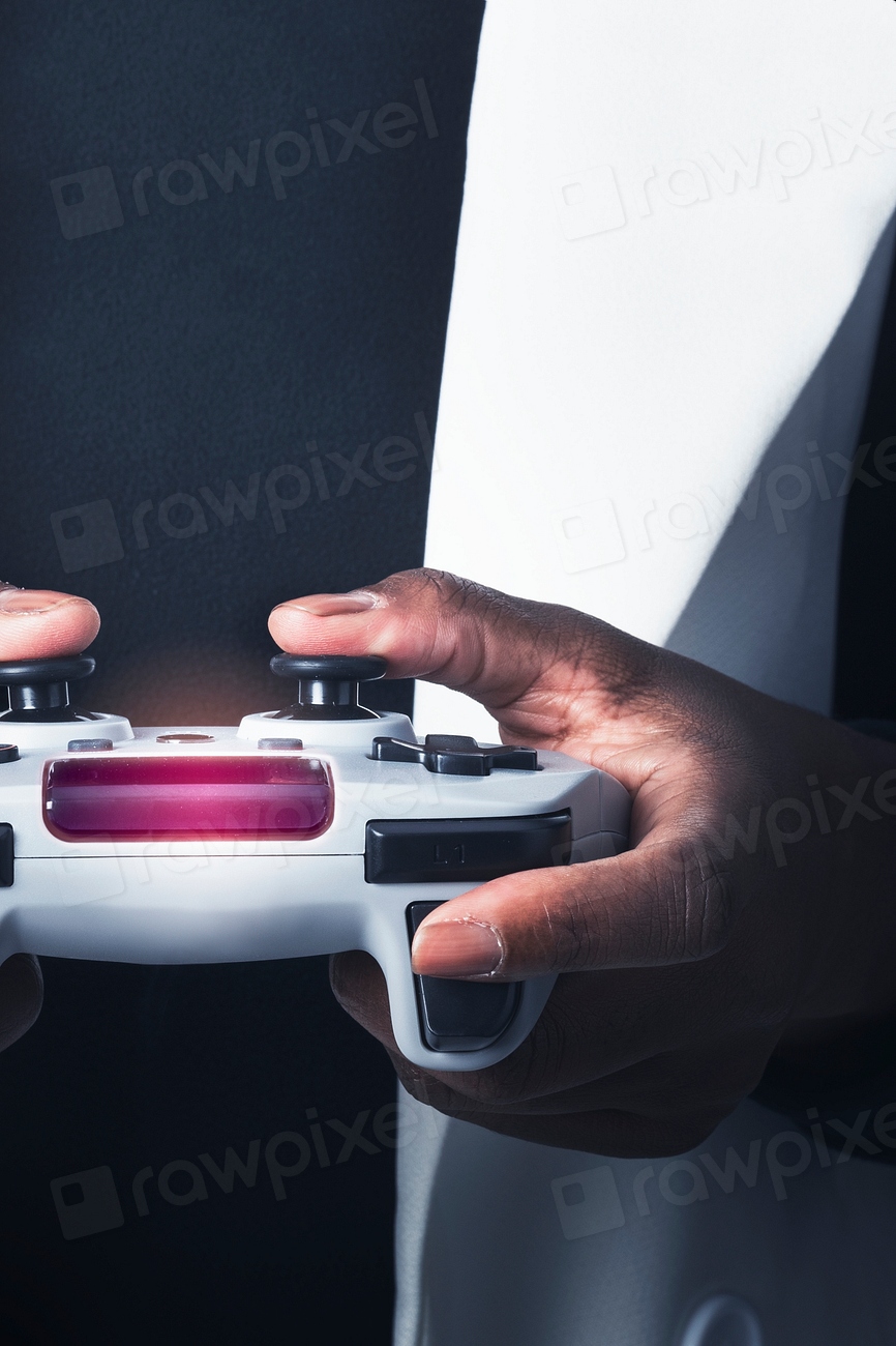 Hands holding video game controller | Premium Photo - rawpixel