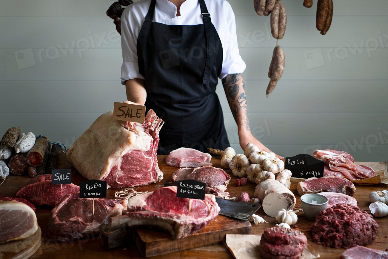Butcher selling meat butcher shop | Premium Photo - rawpixel