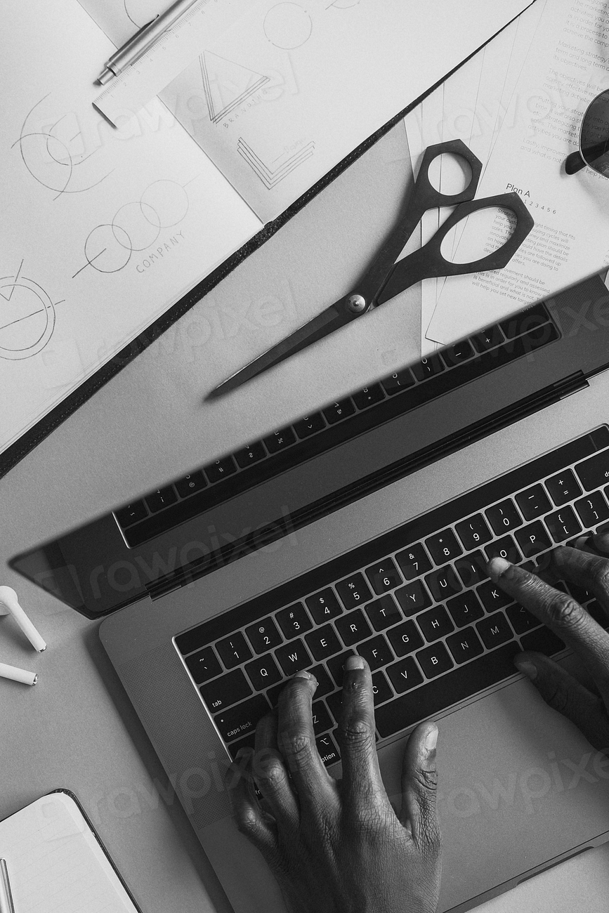 Black man using laptop device | Premium Photo - rawpixel