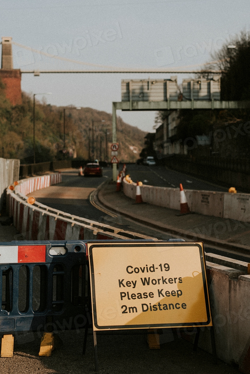 Physical distancing warning sign roadside | Free Photo - rawpixel