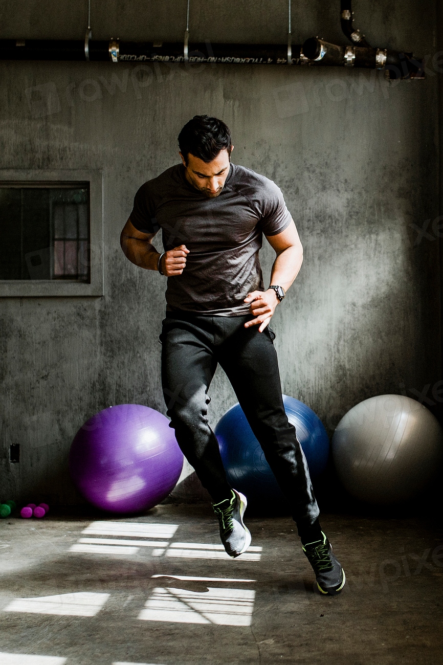 Sportive man doing side side | Premium Photo - rawpixel