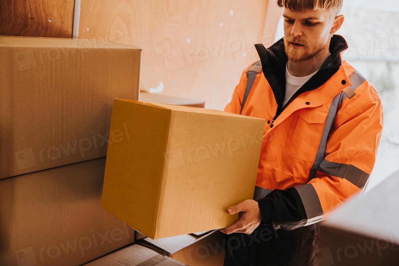 Delivery man loading boxes truck | Premium Photo - rawpixel