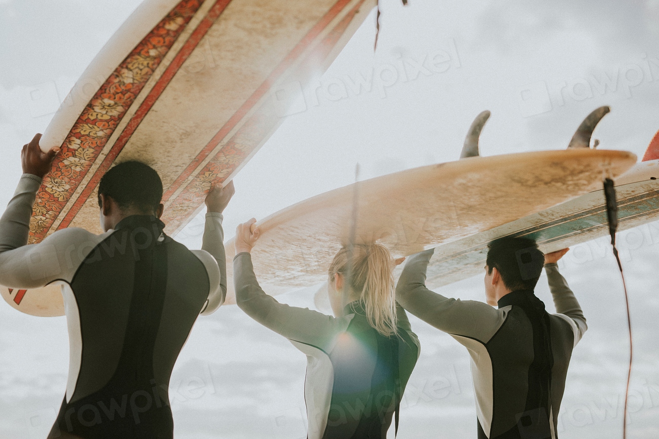 Happy friends surfing at the beach | Premium Photo - rawpixel