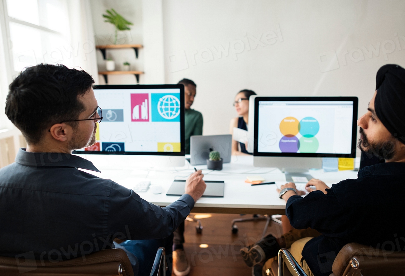 Co-workers working together | Premium Photo - rawpixel