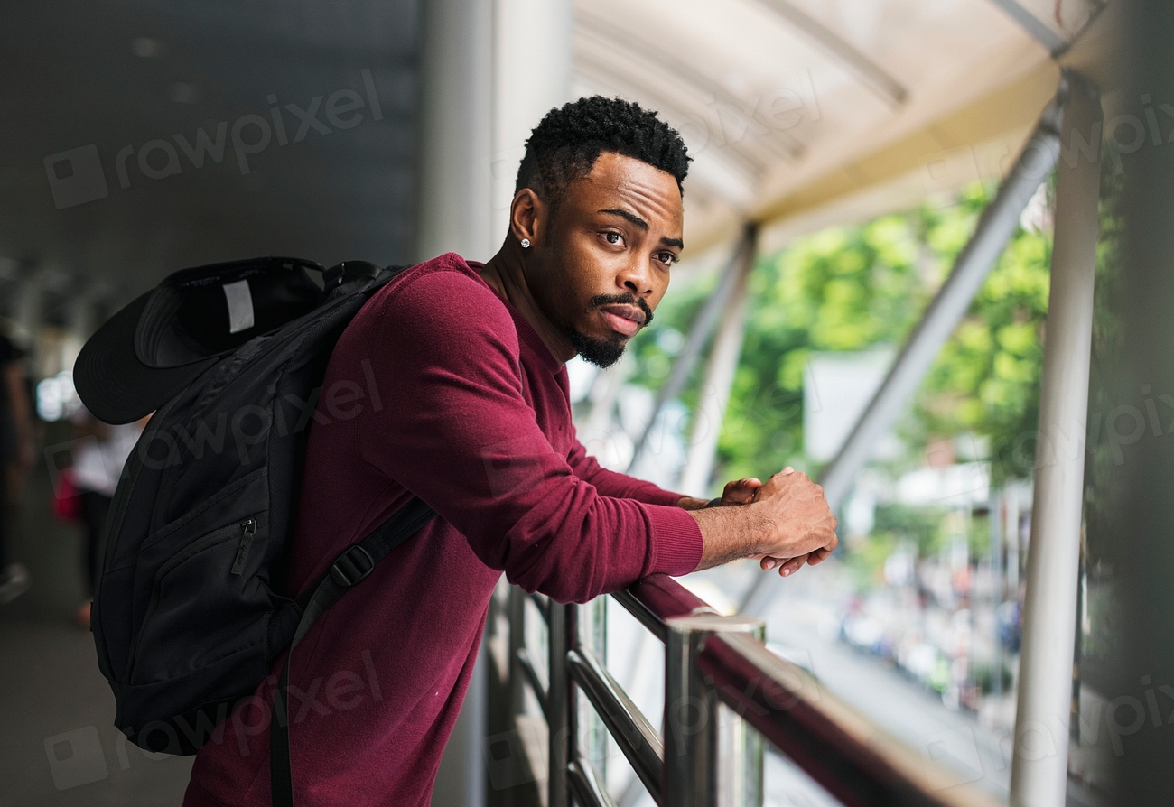 Young man leaning balcony railing | Premium Photo - rawpixel