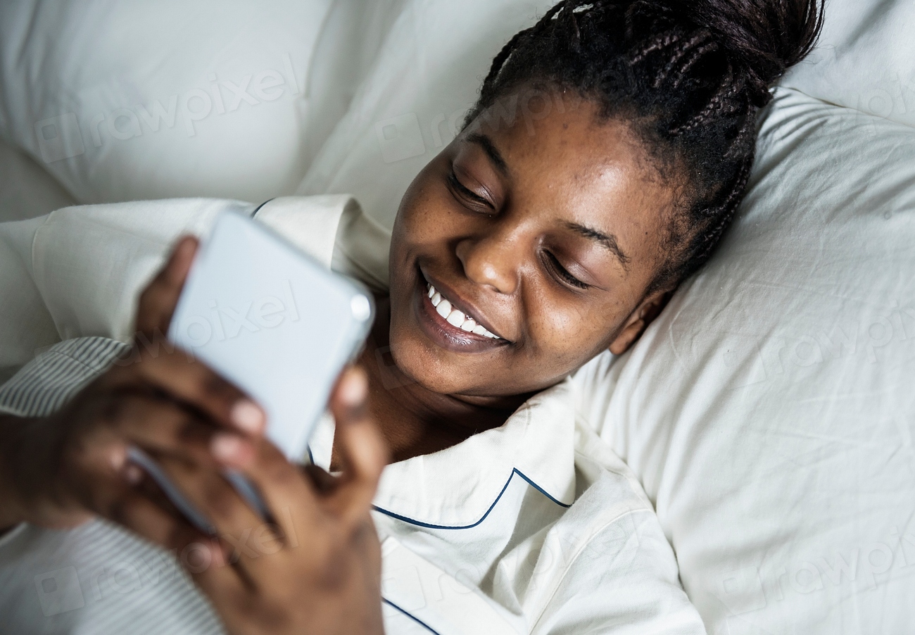 woman using phone bed | Premium Photo - rawpixel