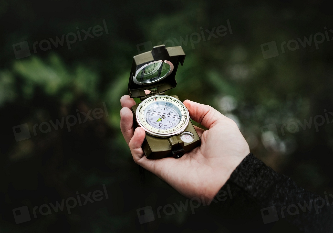 Trekking forest using compass | Premium Photo - rawpixel