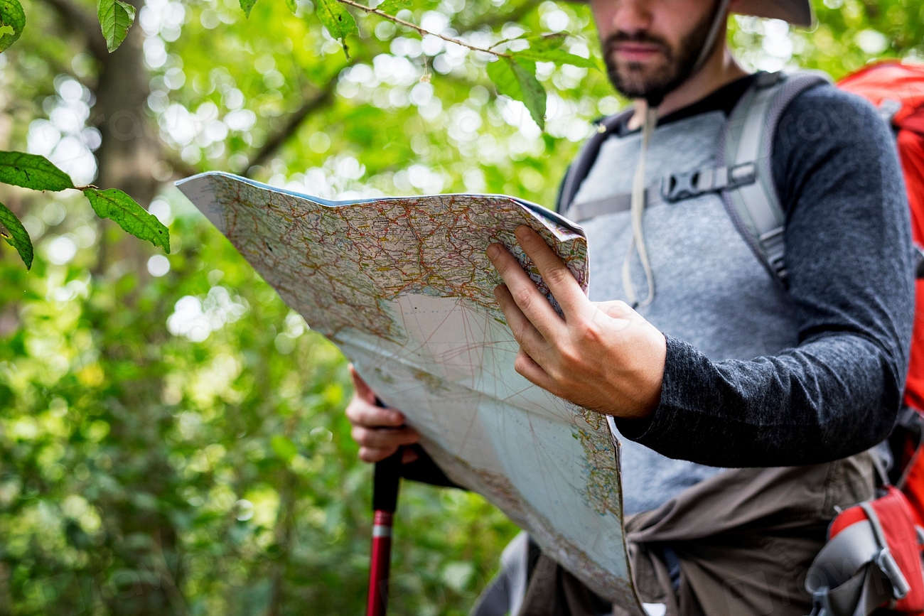 Map checking in the forest | Premium Photo - rawpixel