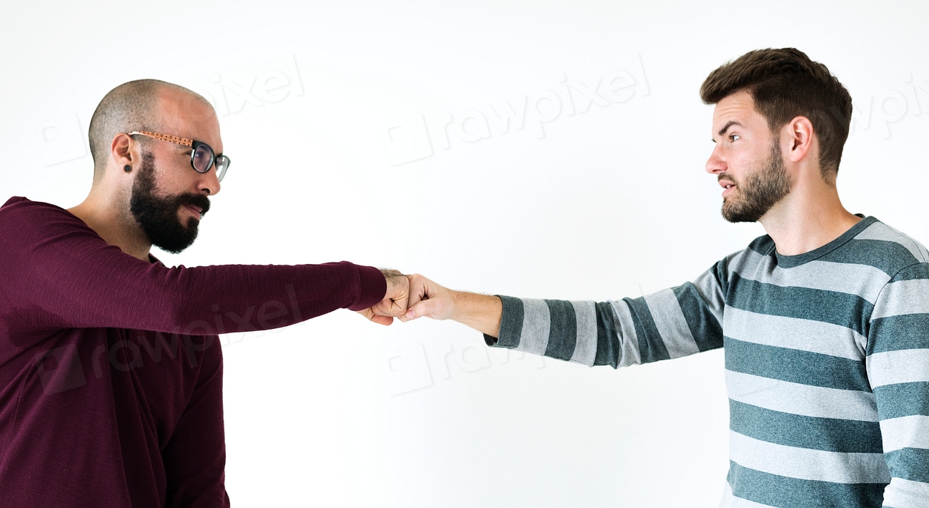 People bumping their fists together | Premium Photo - rawpixel