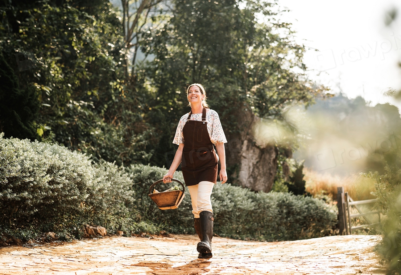 Happy woman walking her farm | Premium Photo - rawpixel