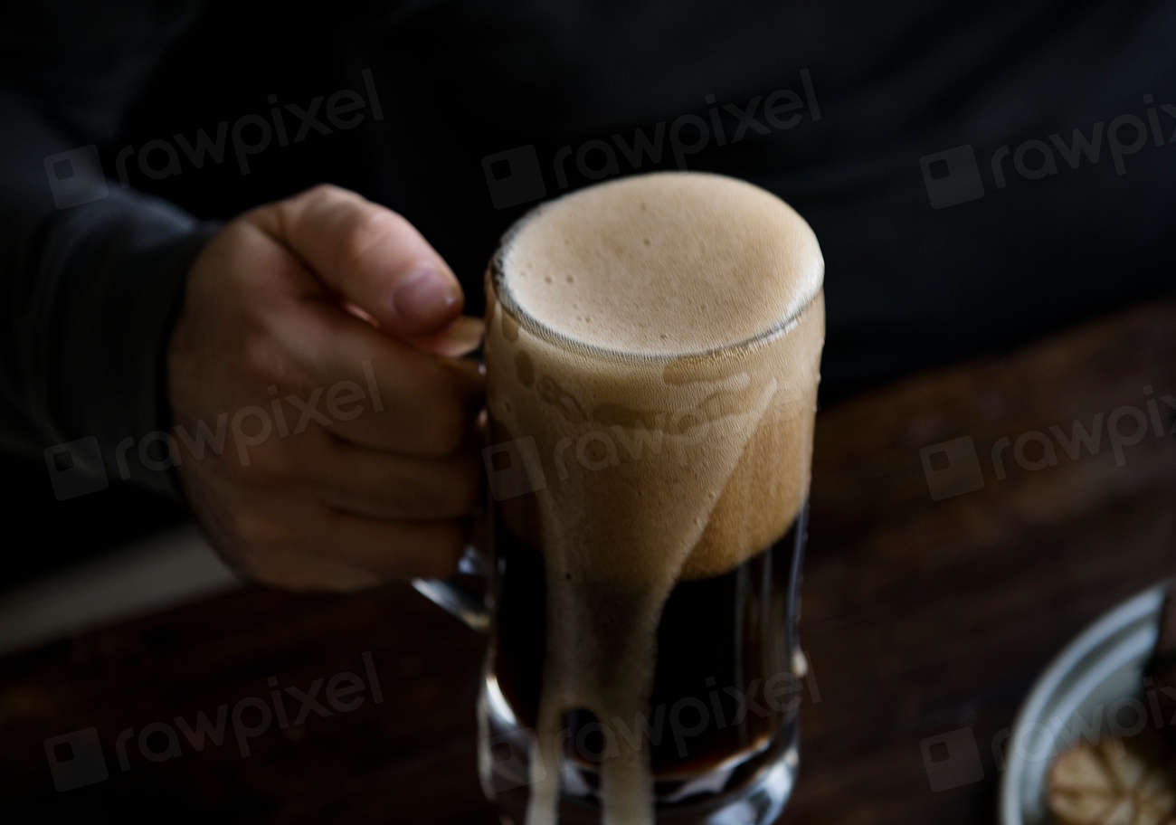 Overflowing pint of beer | Free Photo - rawpixel