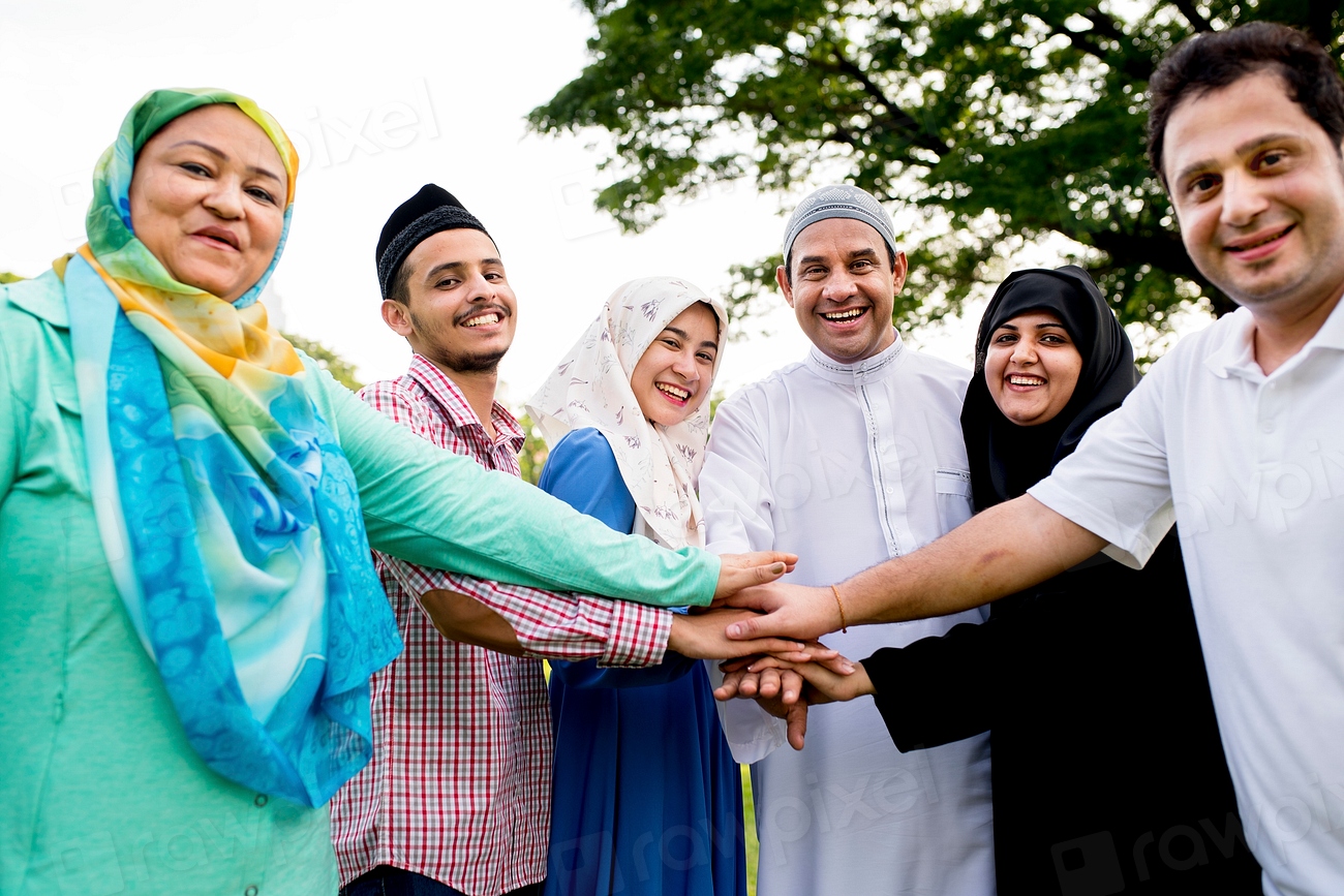 Muslim group friends stacking hands | Premium Photo - rawpixel