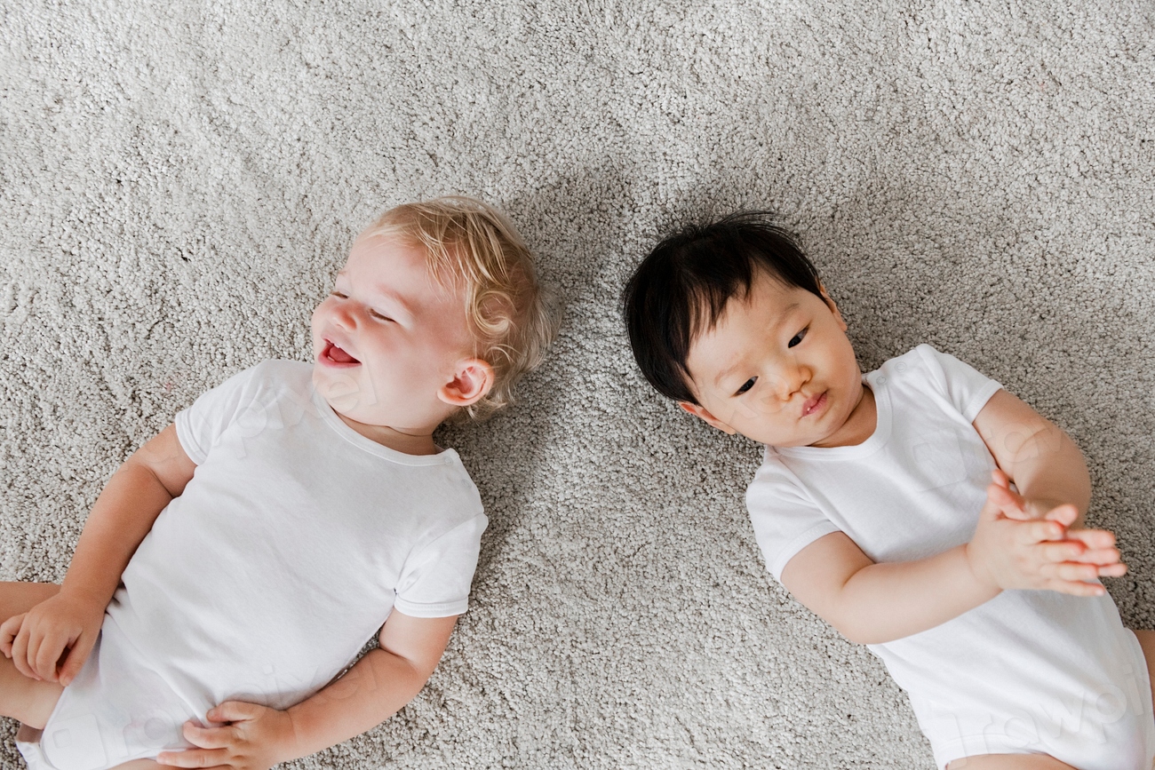 Babies lying on the floor | Free Photo - rawpixel