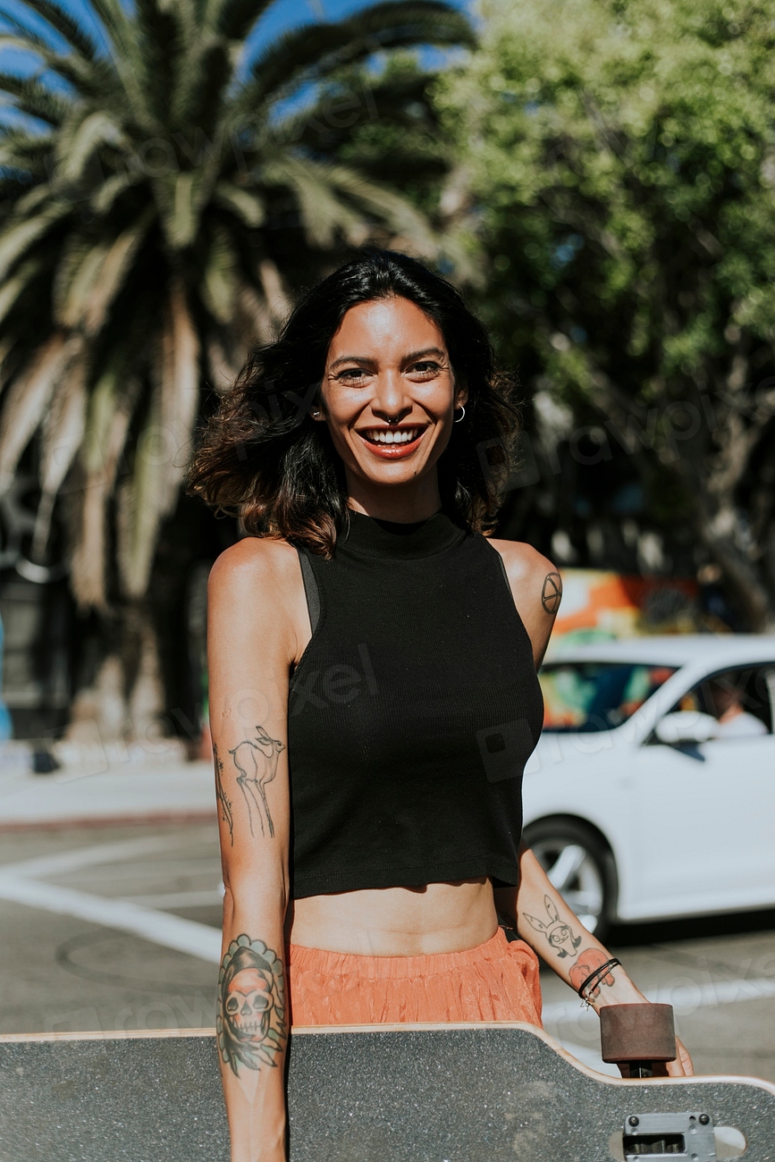 Cool woman with a longboard | Premium Photo - rawpixel