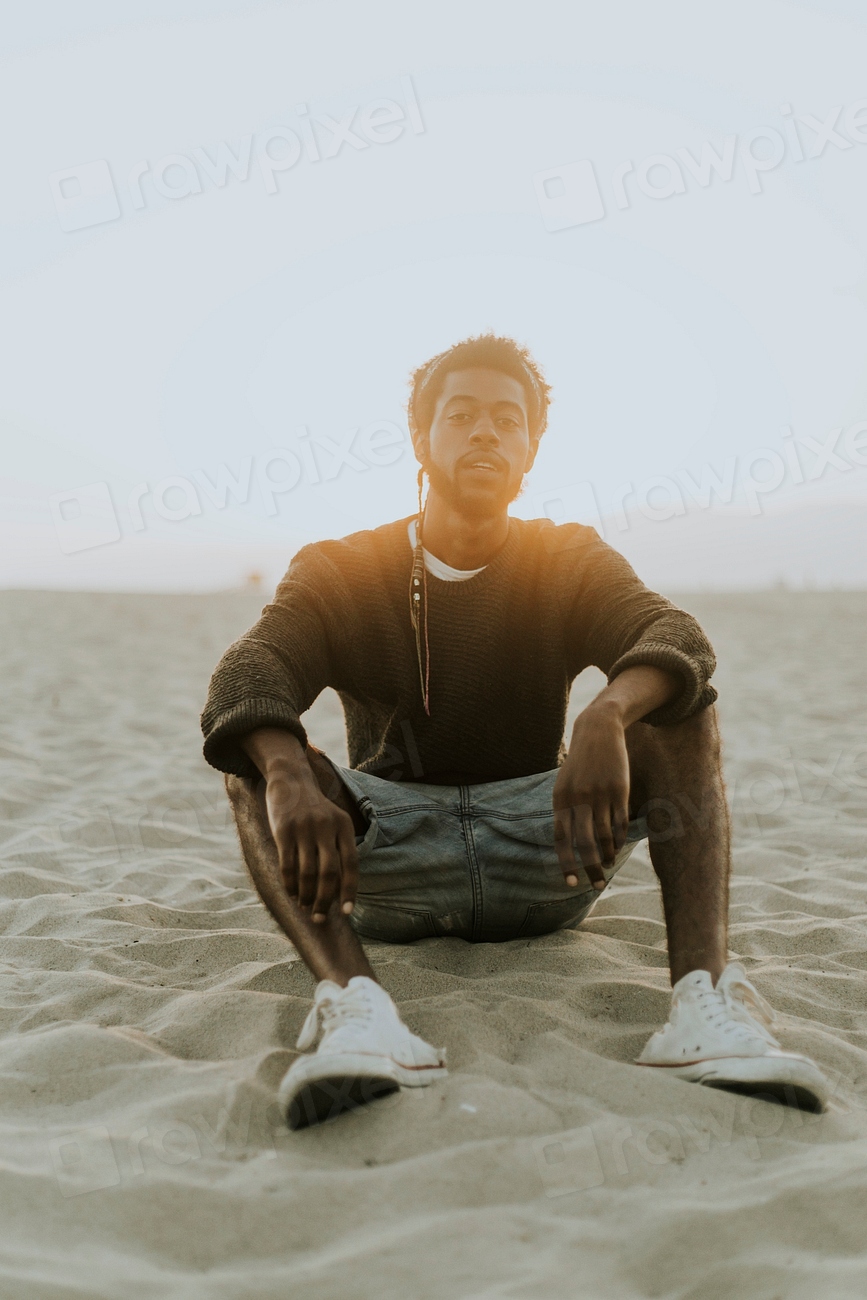 Man sitting at the beach | Premium Photo - rawpixel
