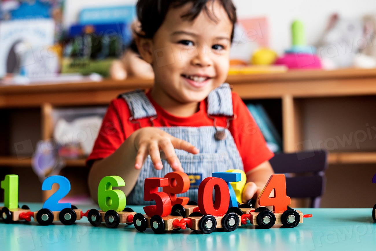 Little boy playing mathematics wooden | Free Photo - rawpixel