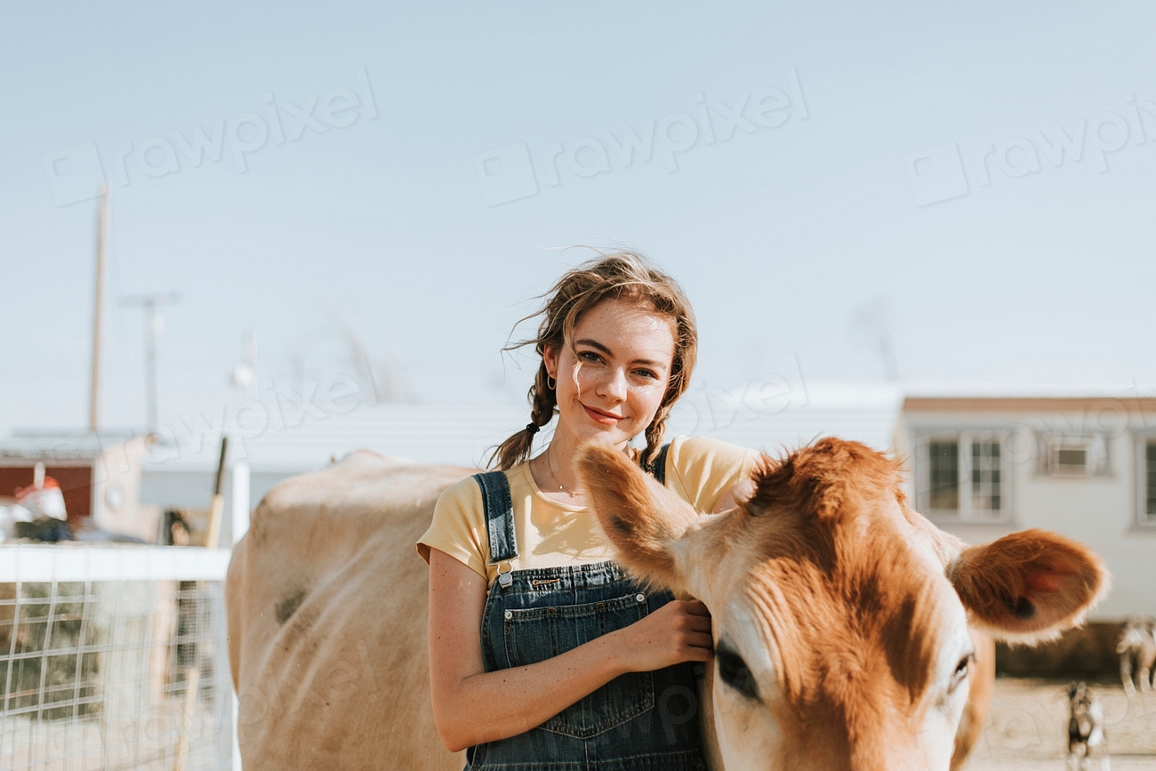Happy woman with a cow | Premium Photo - rawpixel