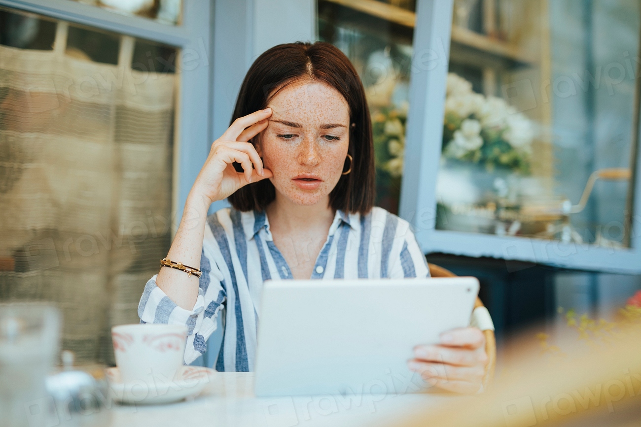 Woman using digital tablet cafe | Premium Photo - rawpixel