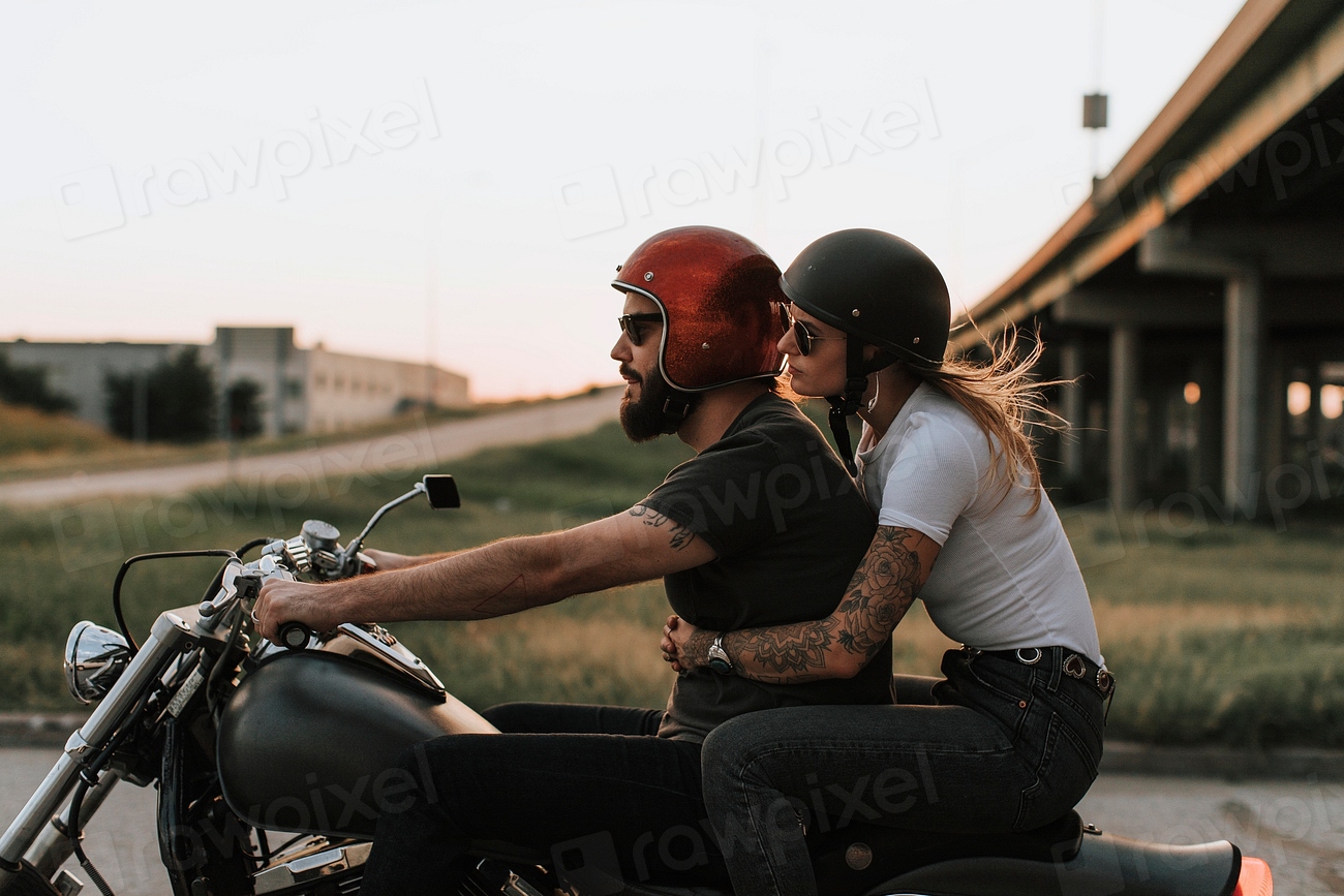 Biker couple riding road sunset | Premium Photo - rawpixel