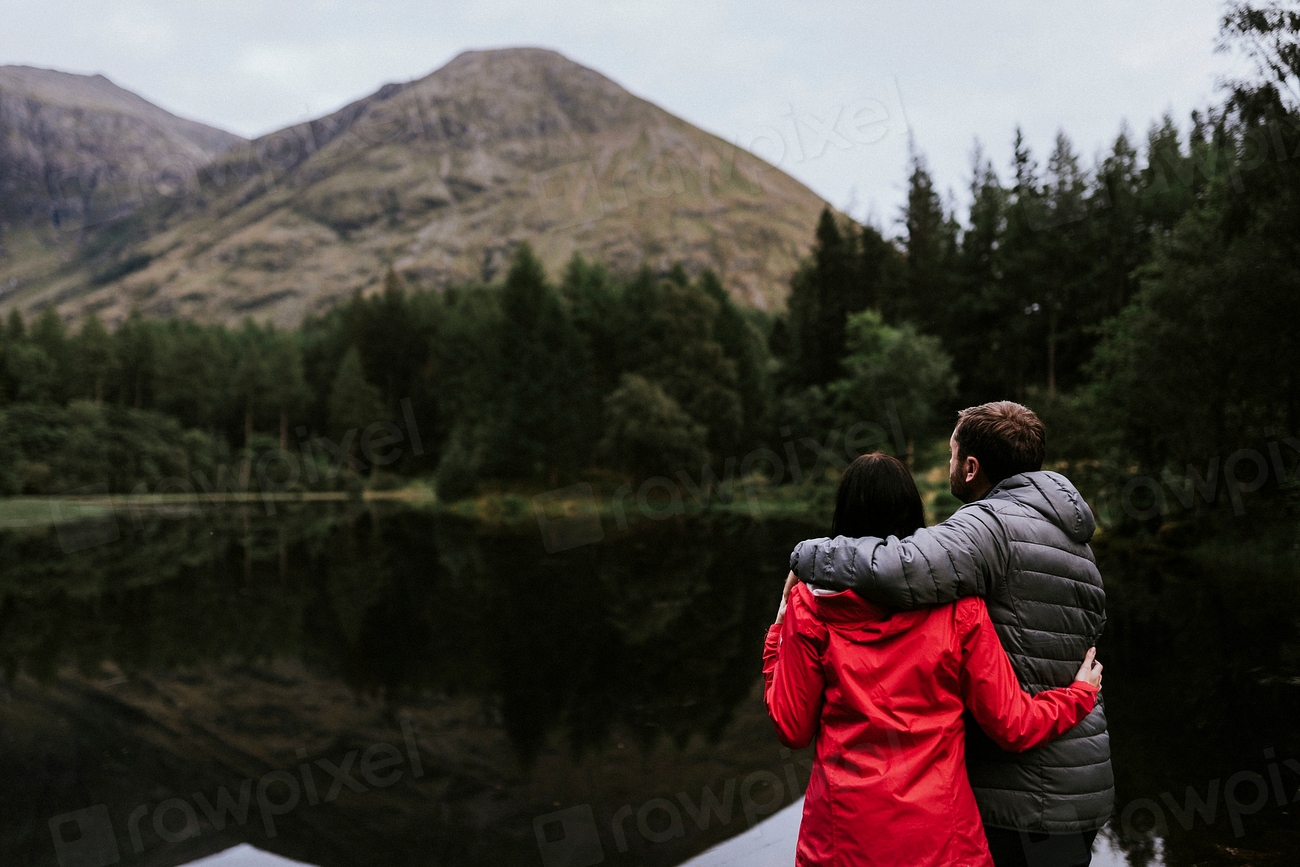 Couple hugging riverside Highlands | Premium Photo - rawpixel