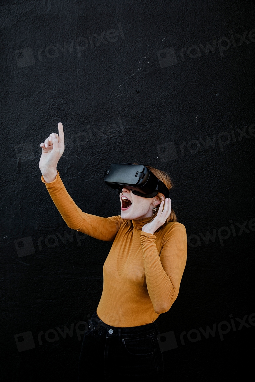 Woman enjoying a VR experience | Premium Photo - rawpixel