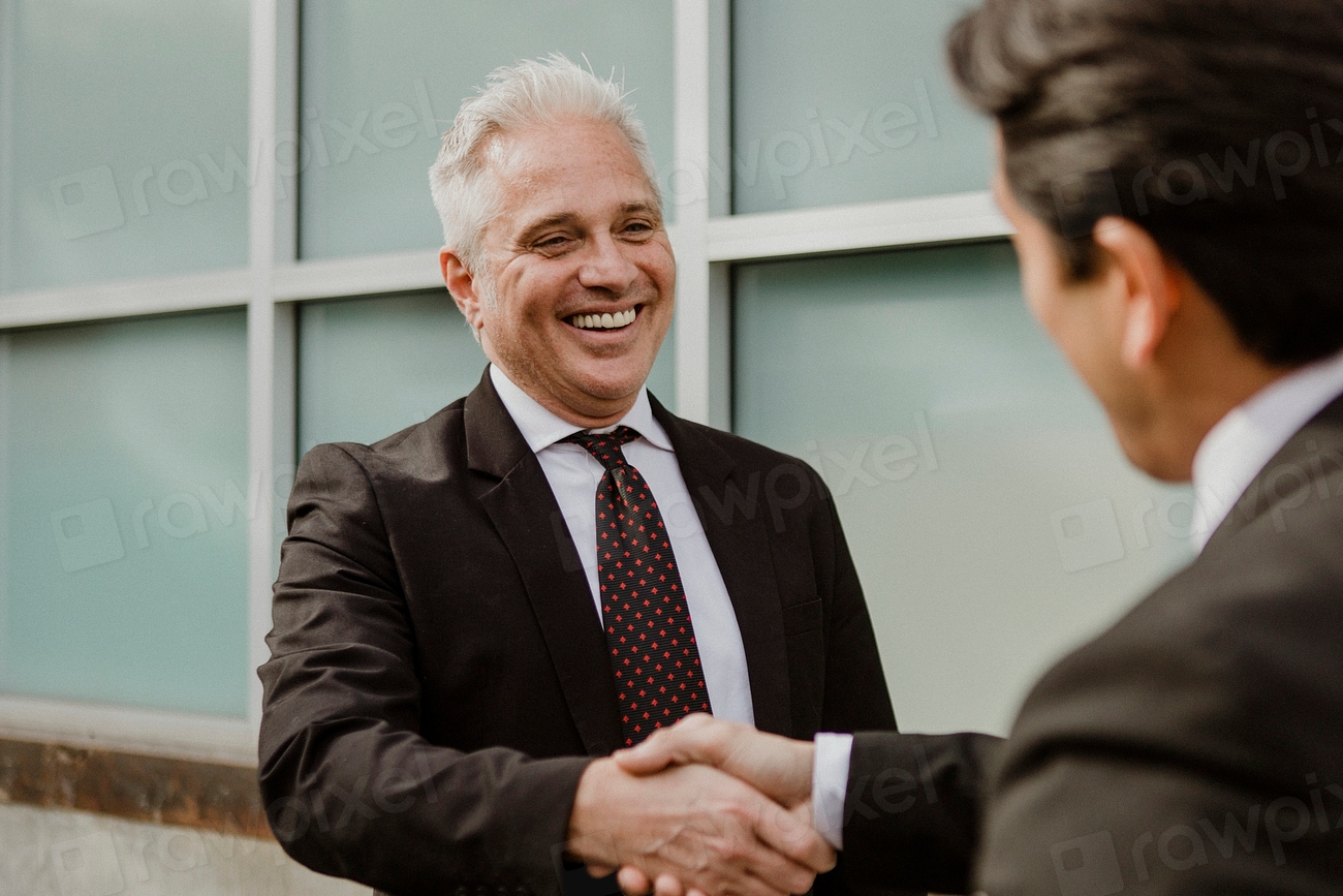 Businessmen making a business deal | Premium Photo - rawpixel