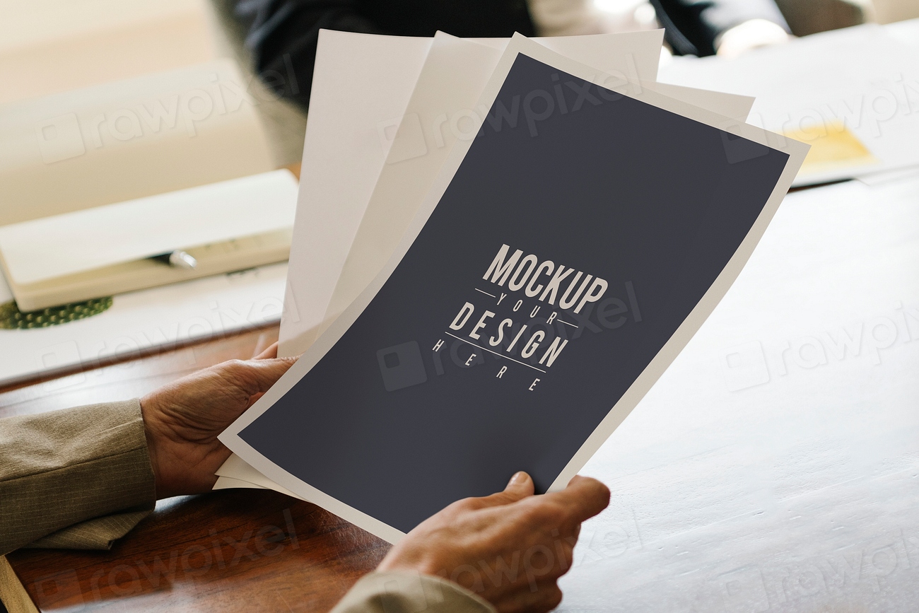 Businesswoman holding paper mockups meeting | Premium PSD Mockup - rawpixel