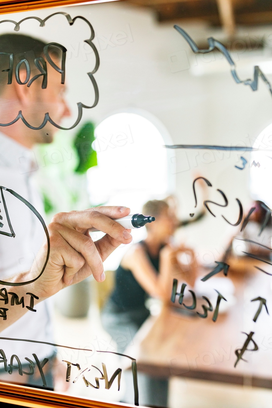 Businessman writing glass wall | Premium Photo - rawpixel