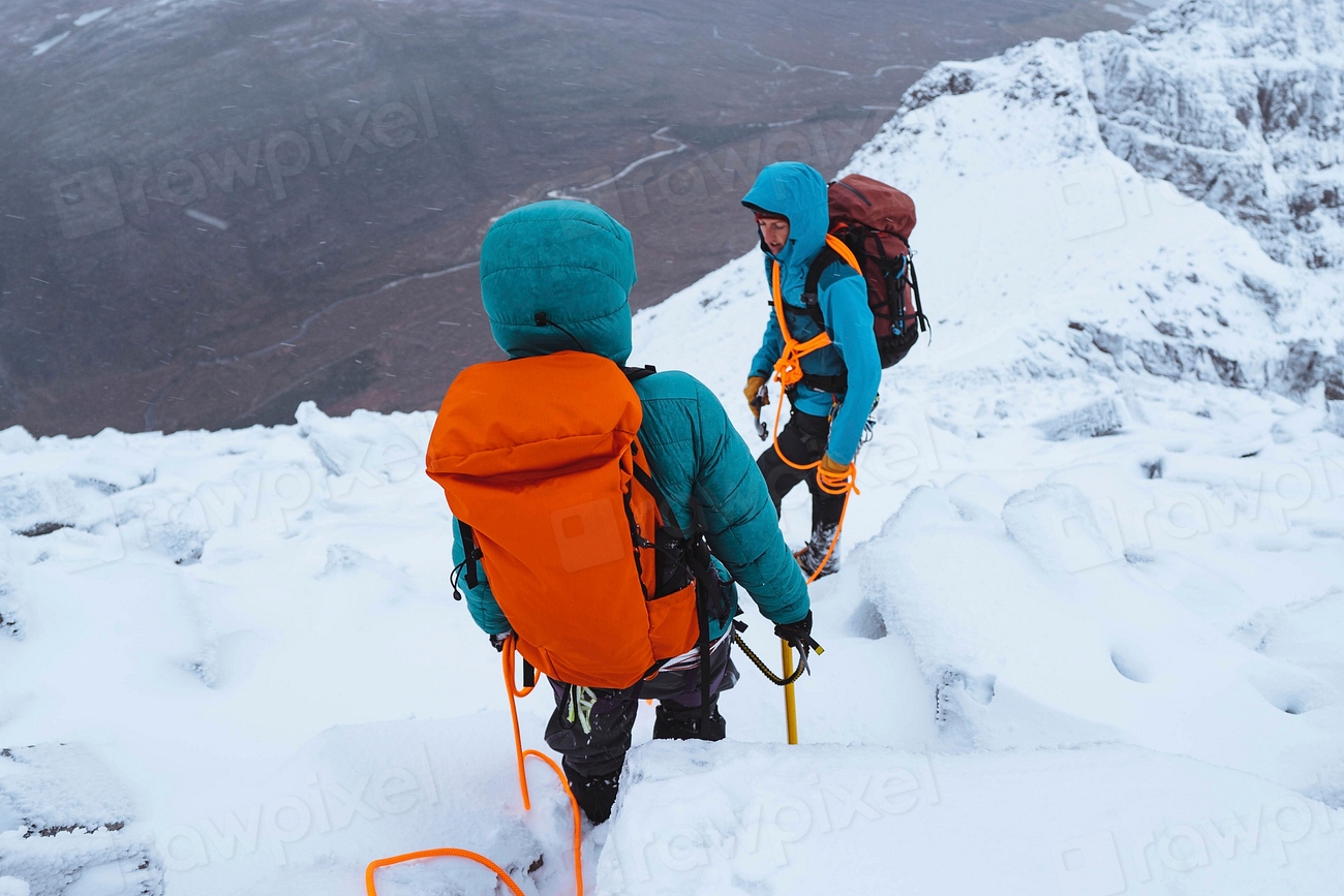 Mountaineers climbing snowy Liathach Ridge | Premium Photo - rawpixel