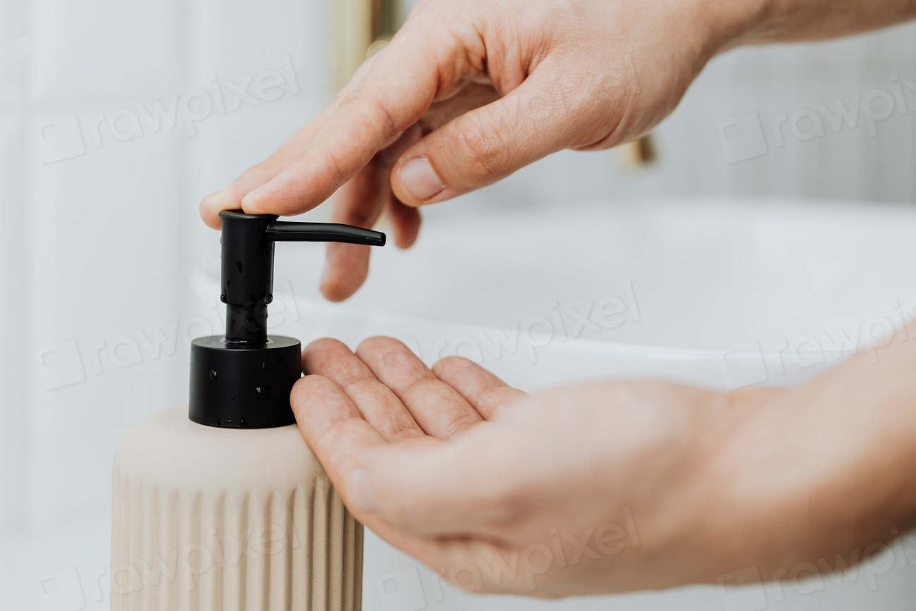 Man using a soap dispenser | Free Photo - rawpixel
