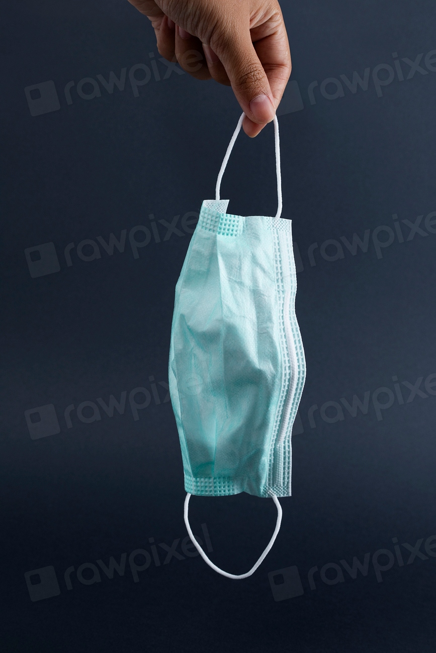 Hand holding used face mask | Premium Photo - rawpixel