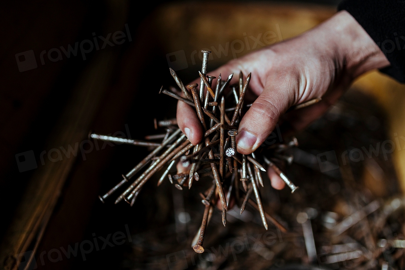 Man holding some rusty needles. | Free Photo - rawpixel