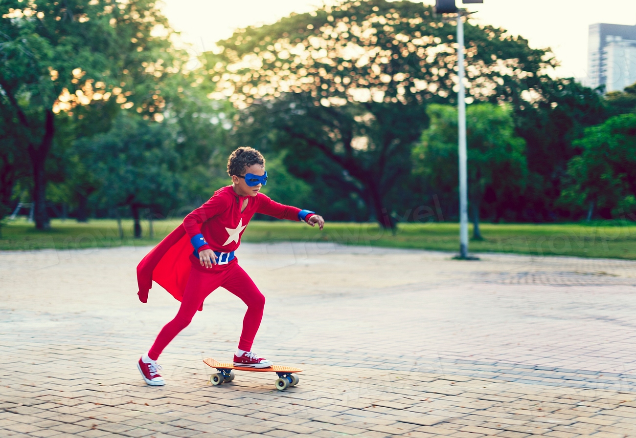Superhero boy on a skateboard | Free Photo - rawpixel