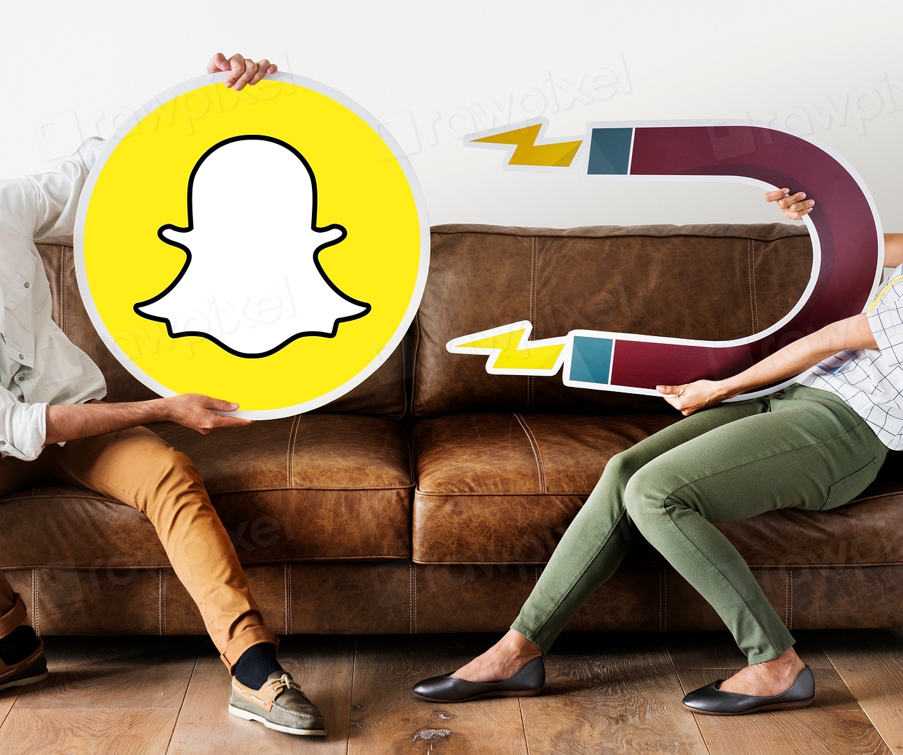 People holding a Snapchat icon | Free Photo - rawpixel
