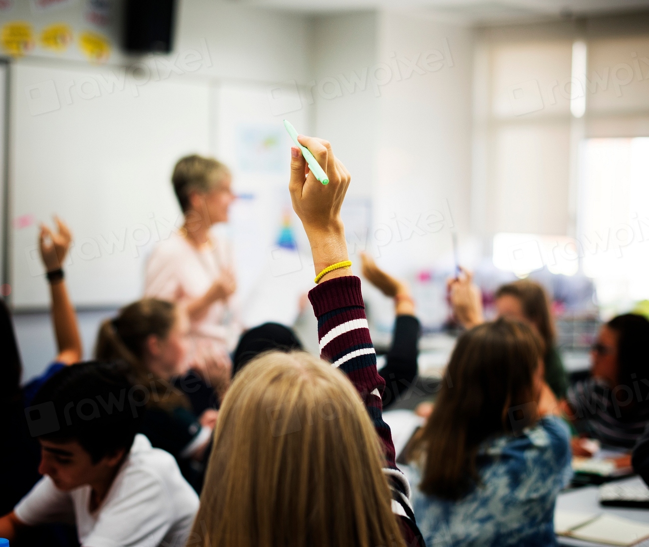 Students their hands responding their | Premium Photo - rawpixel