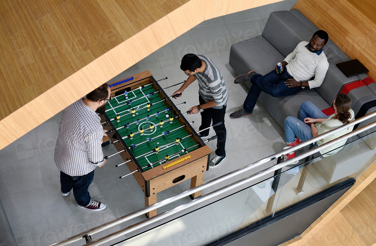 People Playing Enjoying Foosball Table | Premium Photo - rawpixel